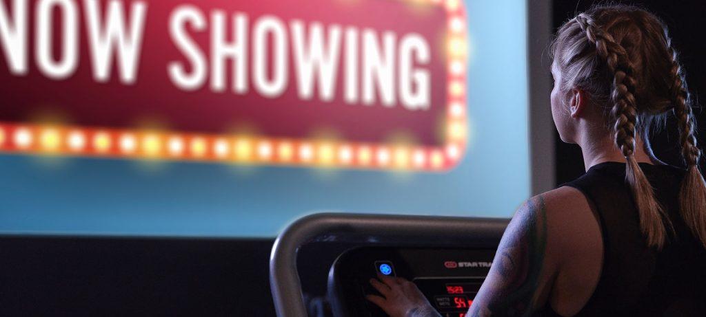 How Cardio Cinema Motivates Your Workout | EōS Fitness