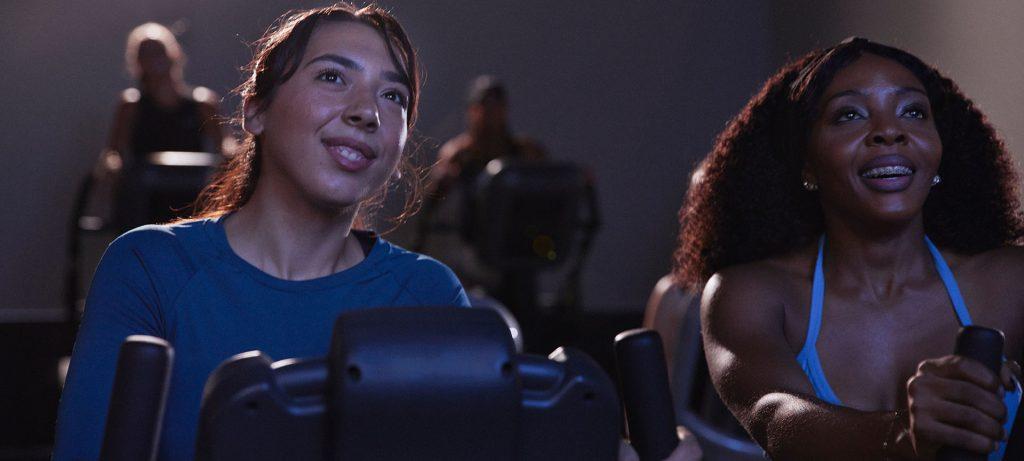 How Cardio Cinema Motivates Your Workout | EōS Fitness